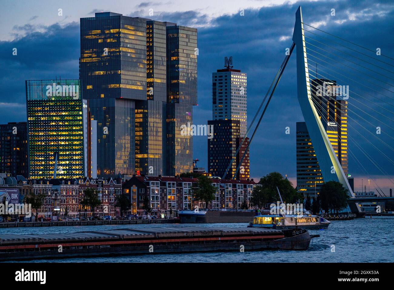 The skyline of Rotterdam, with the Erasmus Bridge over the Nieuwe Maas ...