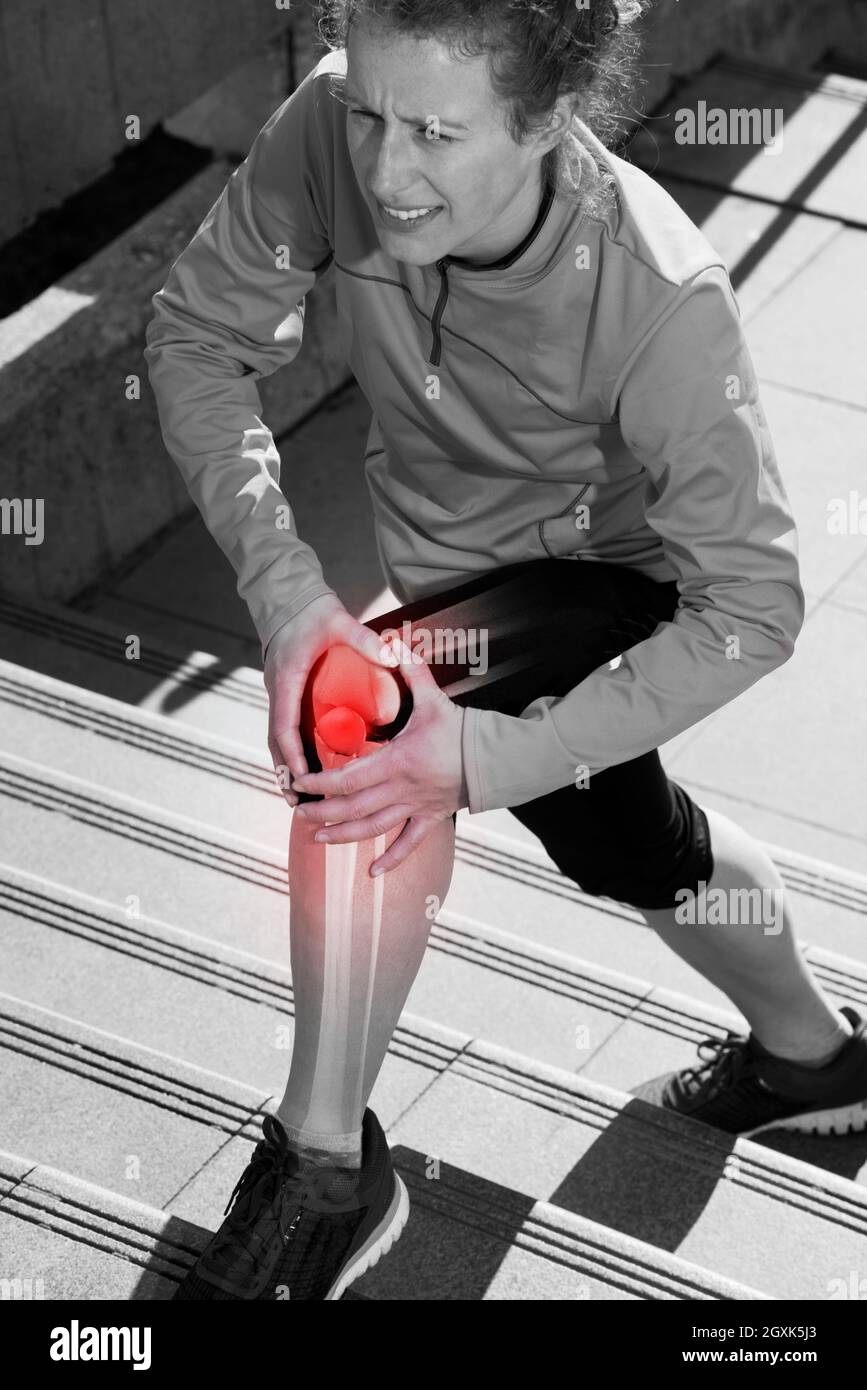 runner knee injury and pain on morning jogging with skelethon Stock ...