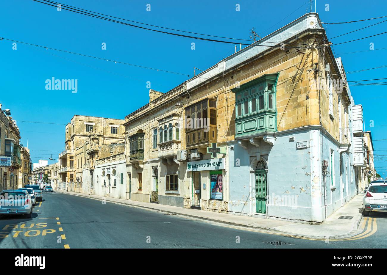 Typical Maltese residential architecture with brightly coloured timber ...