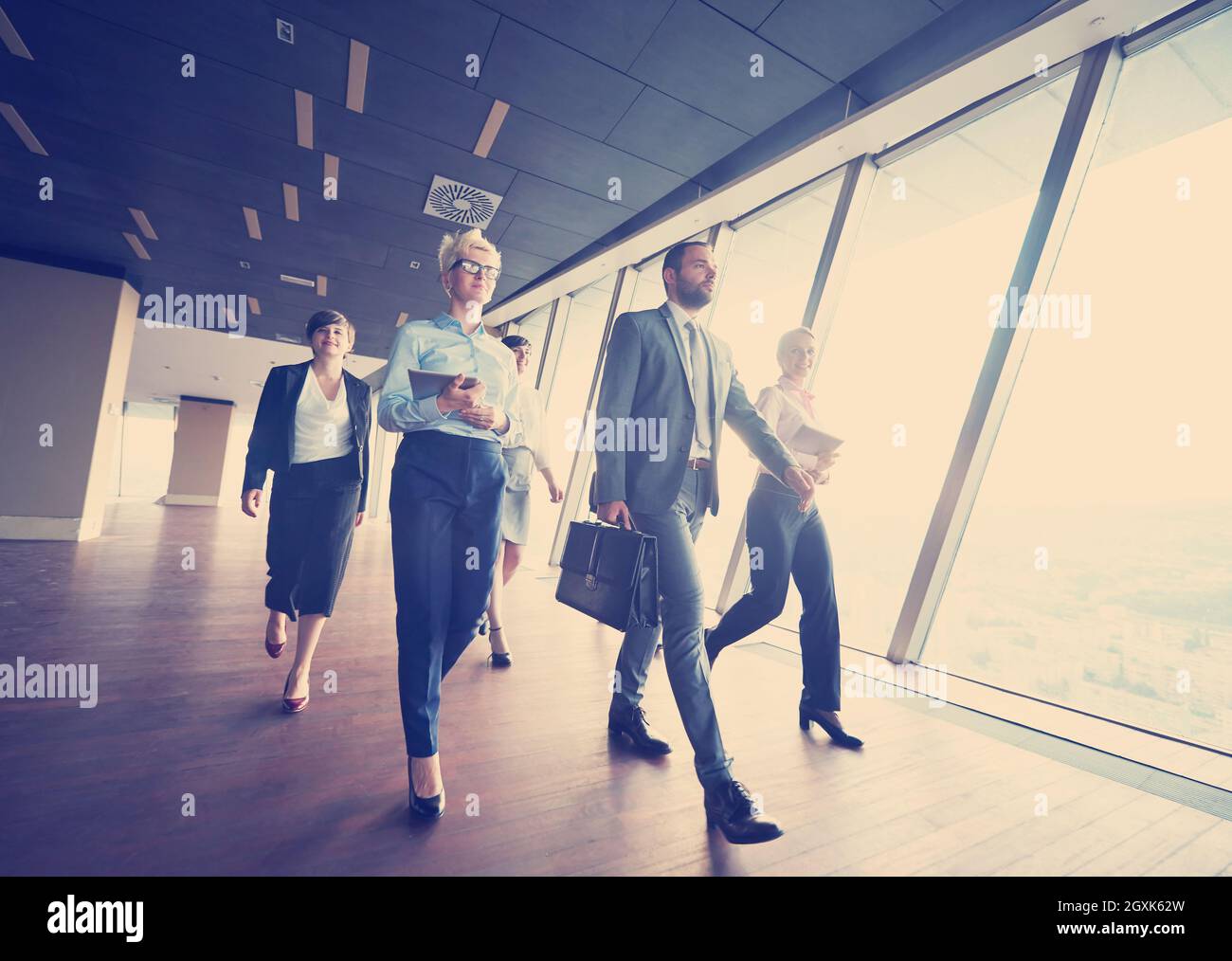 business team, businesspeople group walking at modern bright office ...