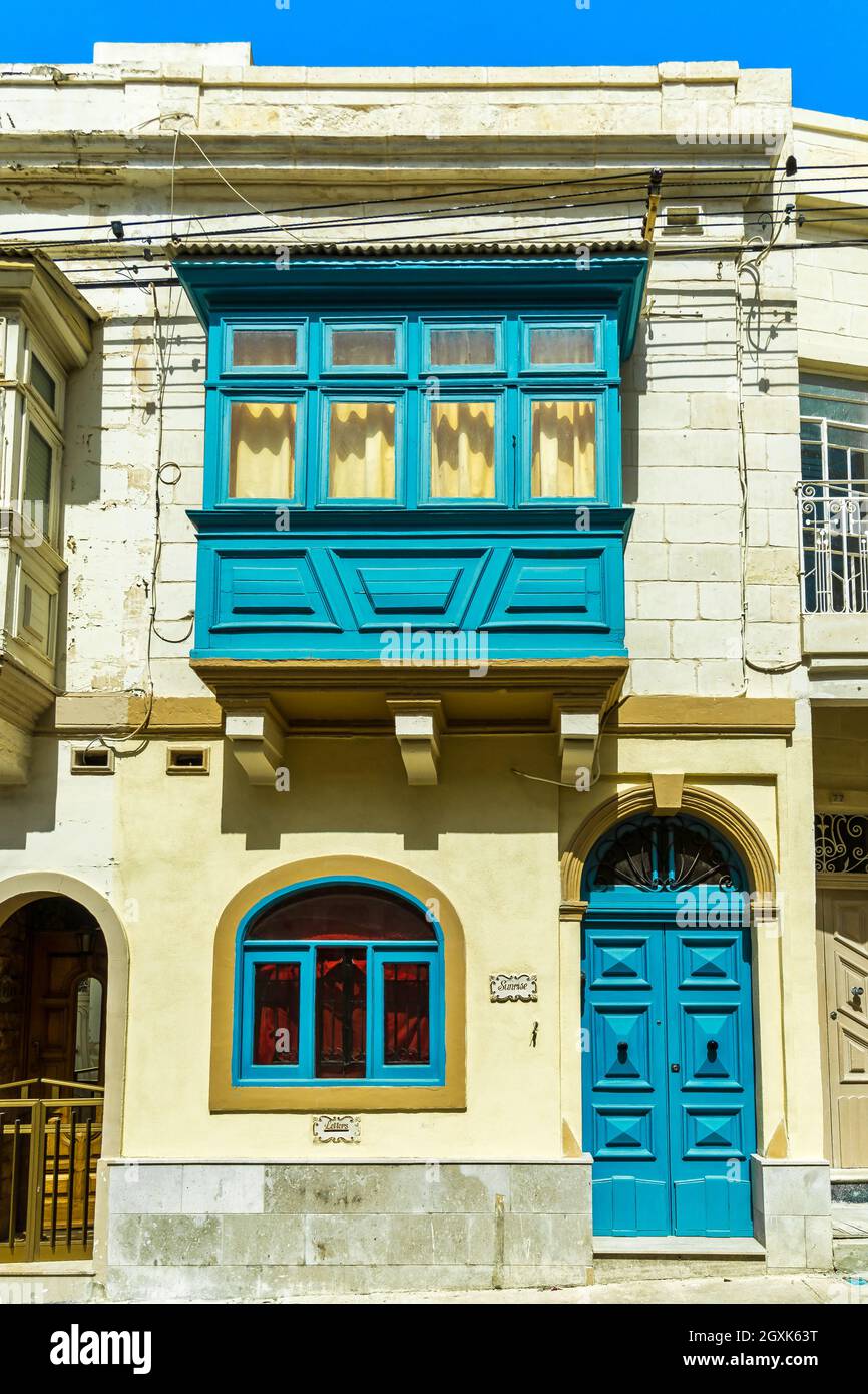 Typical Maltese residential architecture with brightly coloured timber ...