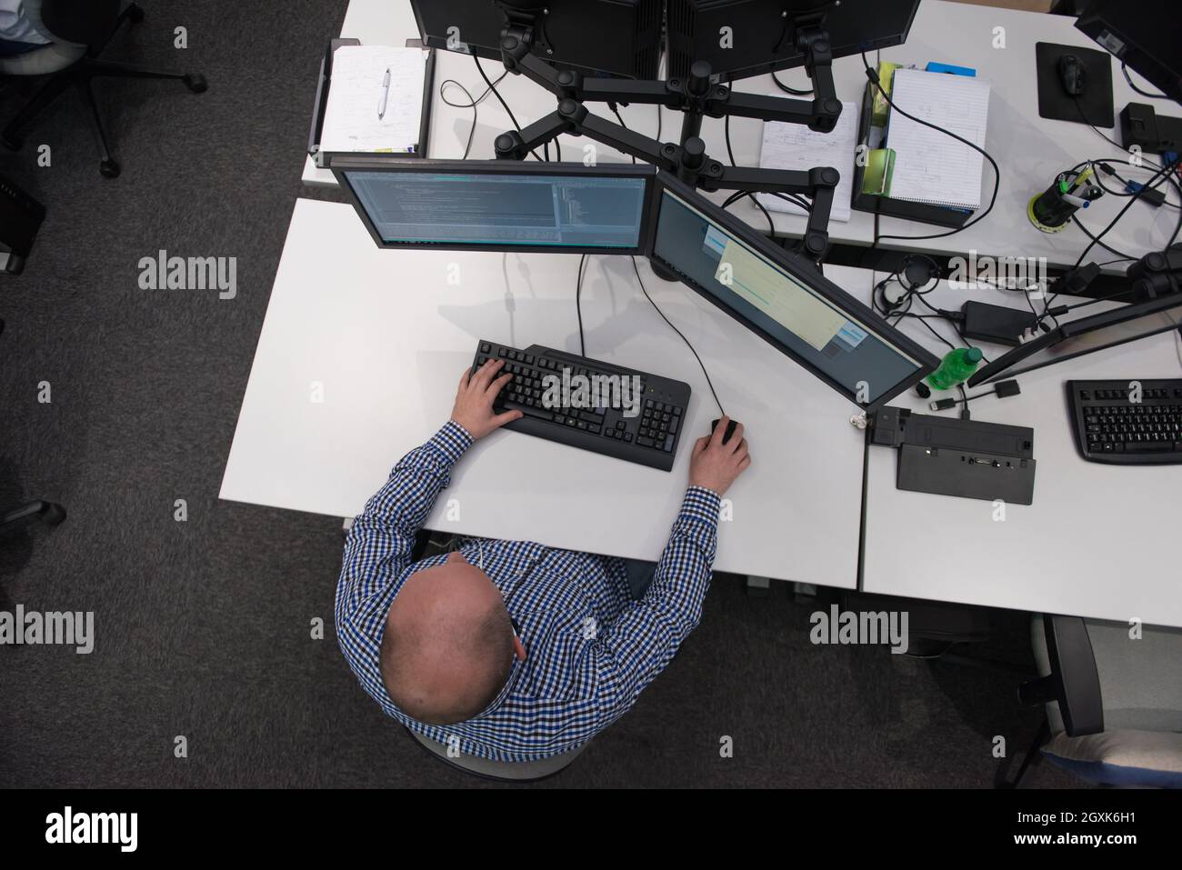 top view of software developer writing programming code on computer ...