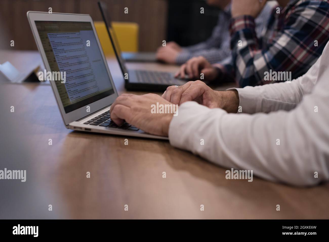 software developer writing programming code on laptop computer Stock ...