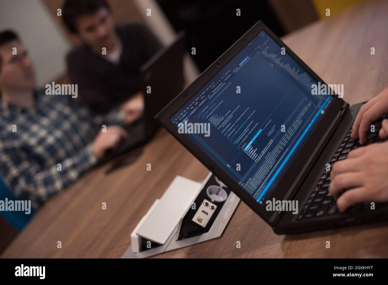 software developer writing programming code on laptop computer Stock ...
