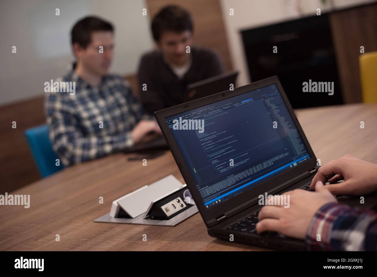 software developer writing programming code on laptop computer Stock ...