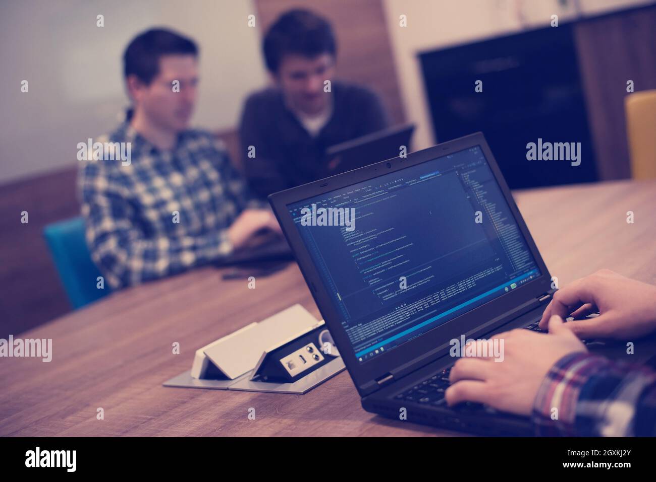 software developer writing programming code on laptop computer Stock ...
