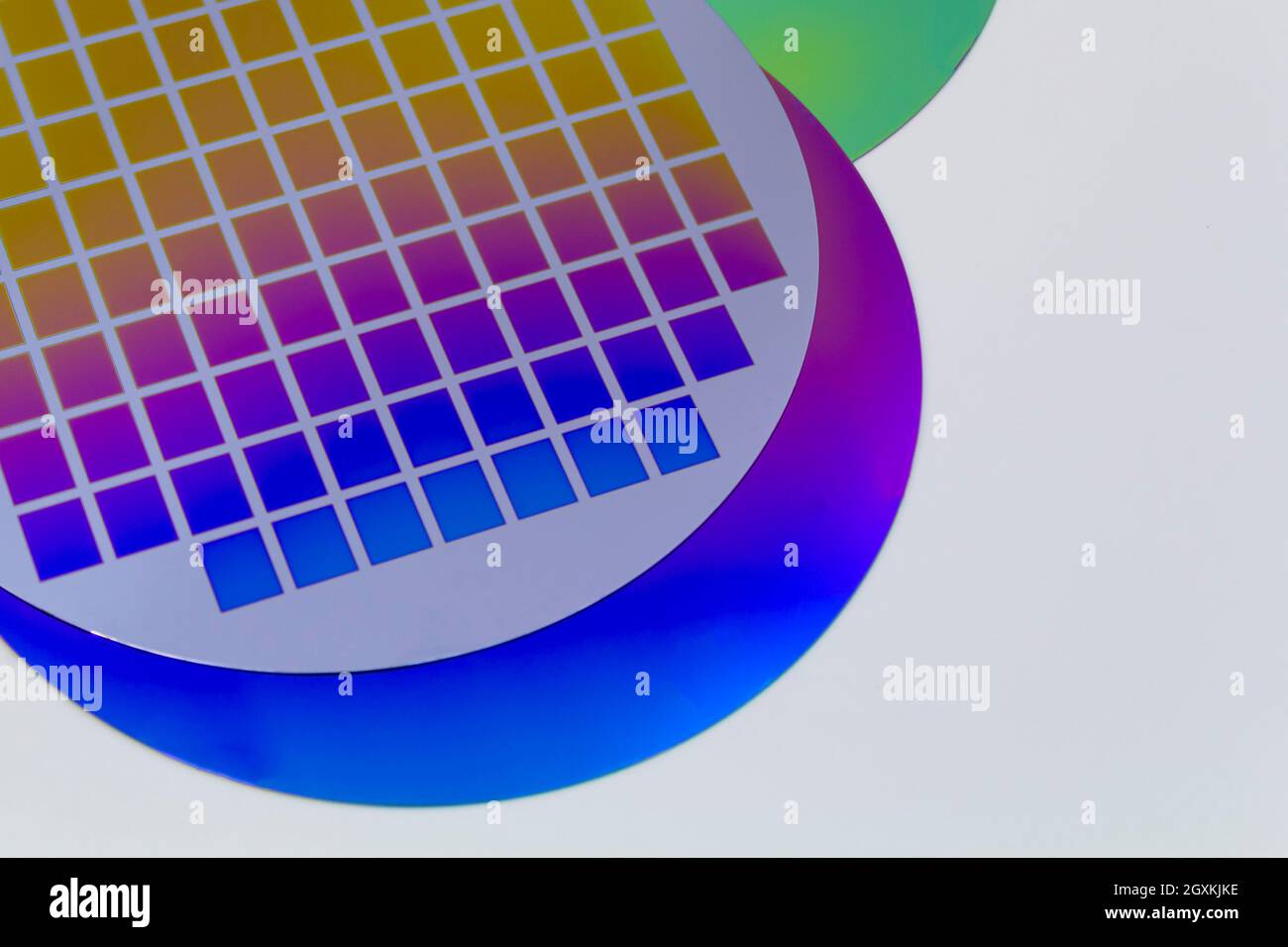 Several silicon wafers with printed circuit and different color. Banner ...
