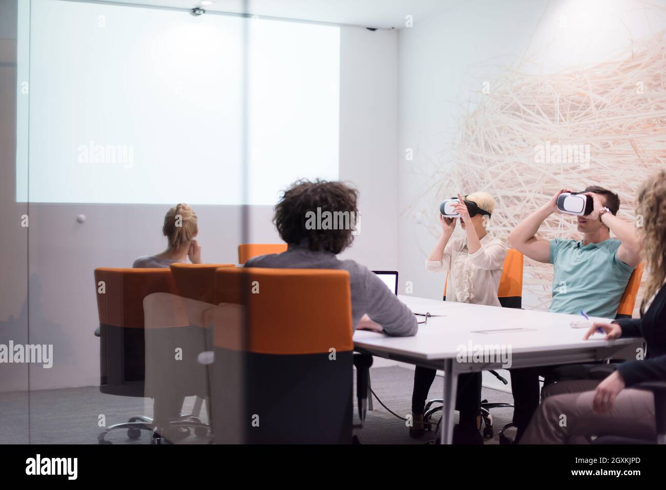 startup Business team using virtual reality headset in night office ...