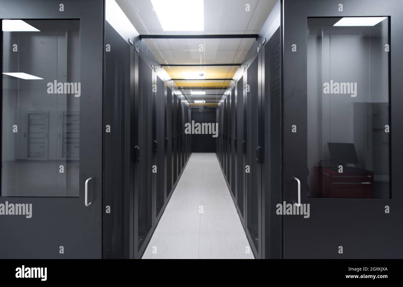 modern server room with black servers and hardwares in a internet data ...