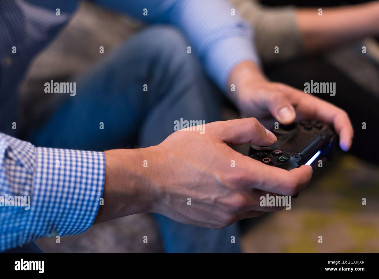 Work hard play hard. Workers Playing computer games in creative startup ...