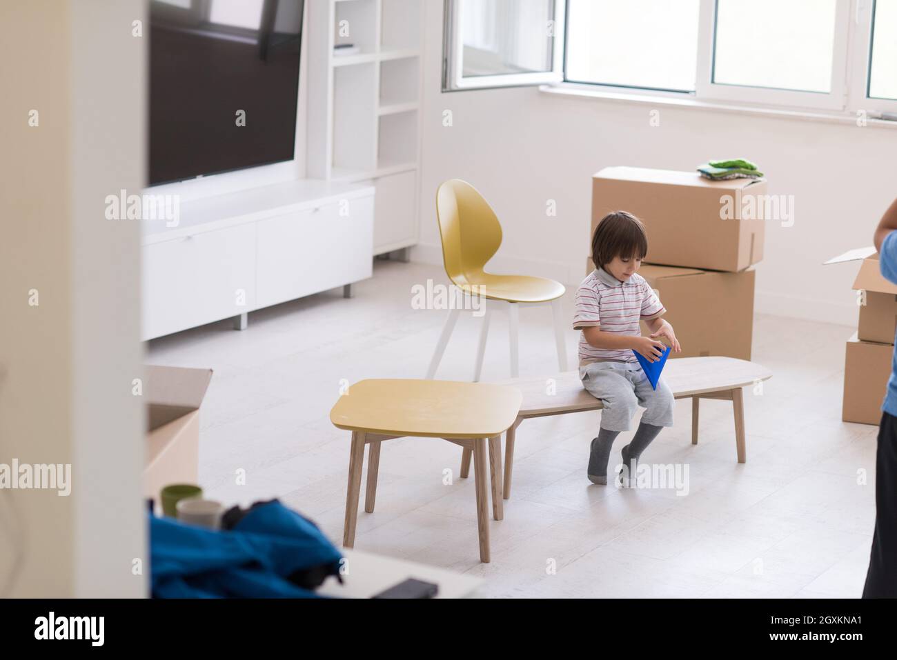 happy young boys enjoying their new modern home Stock Photo - Alamy