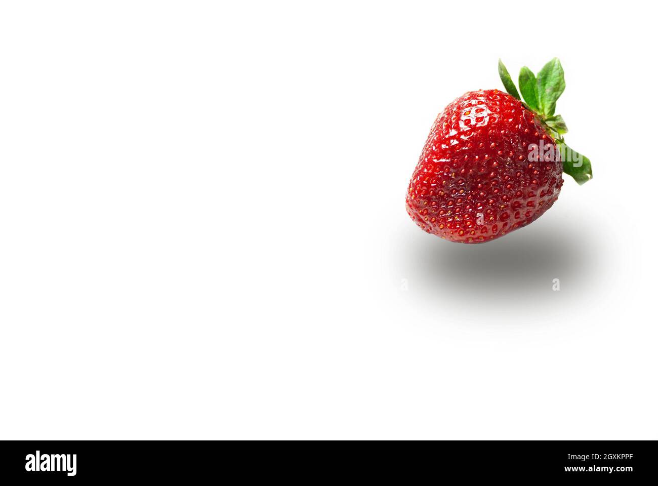 Strawberry with shadow levitation isolated on white background Stock ...