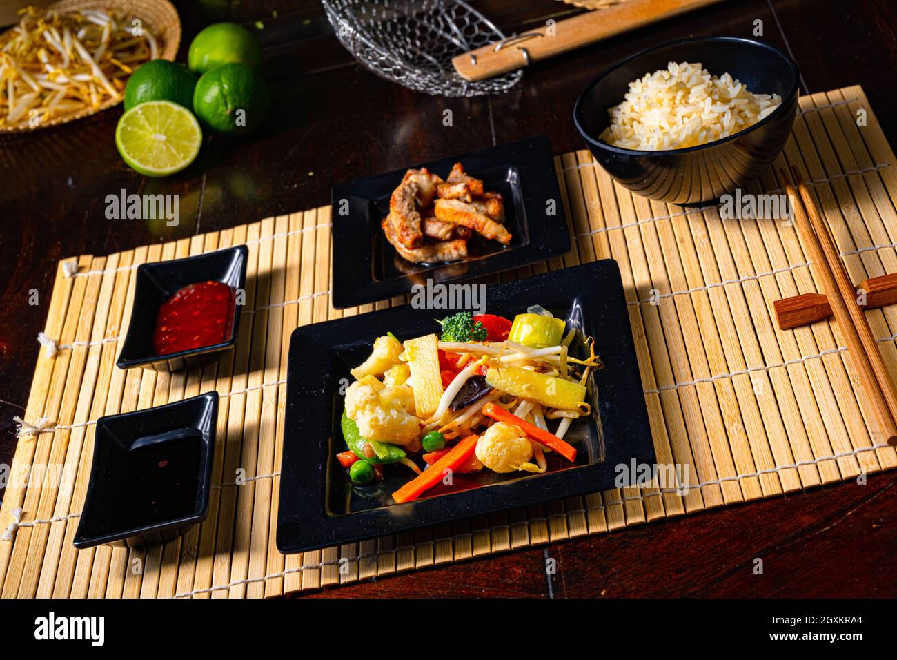 Fried vegetables from the wok with deep fried meat Stock Photo - Alamy