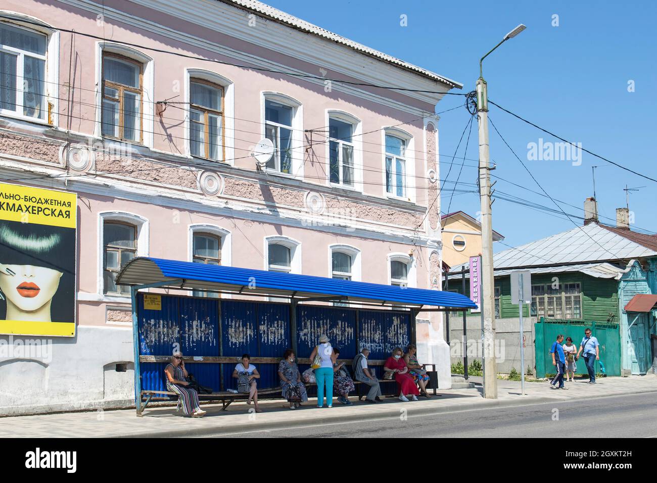 Yelets, Lipetsk District , Russia- June, 2021, People sit at the bus ...