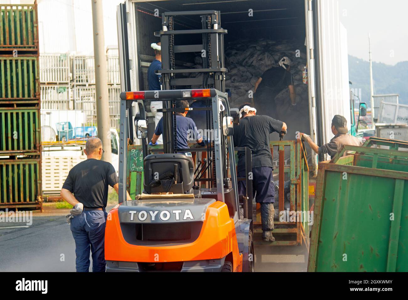 Loading frozen tuna fish into a refrigerated truck, Shizuoka Port ...