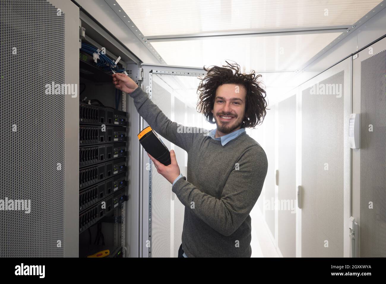 Technician using digital cable analyzer hi-res stock photography and ...