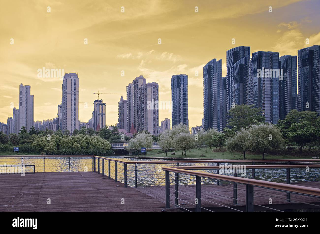 Lake, peer and skyscrapers in fine art color Stock Photo - Alamy
