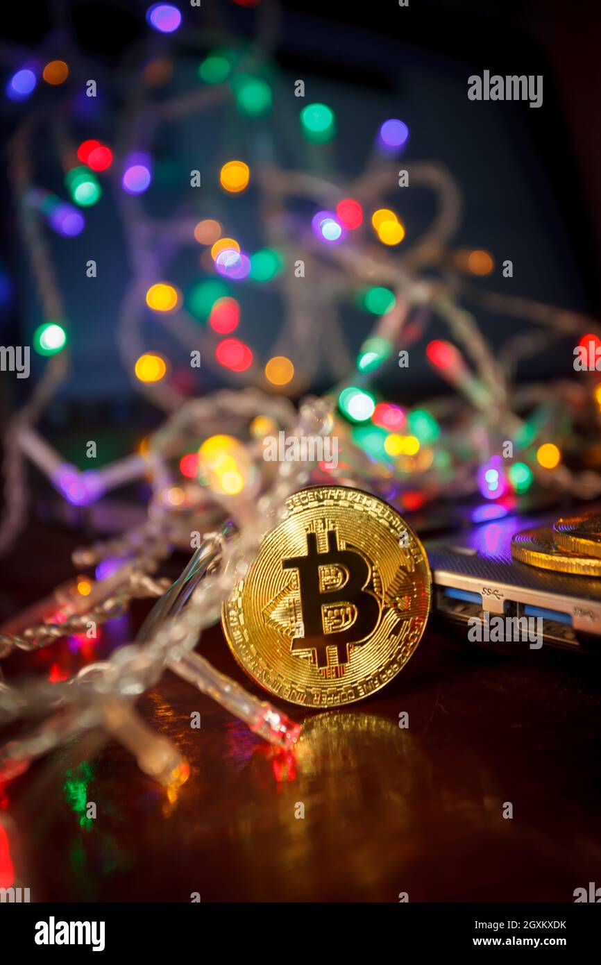 Christmas bitcoin garland gifts and fir branches Stock Photo - Alamy