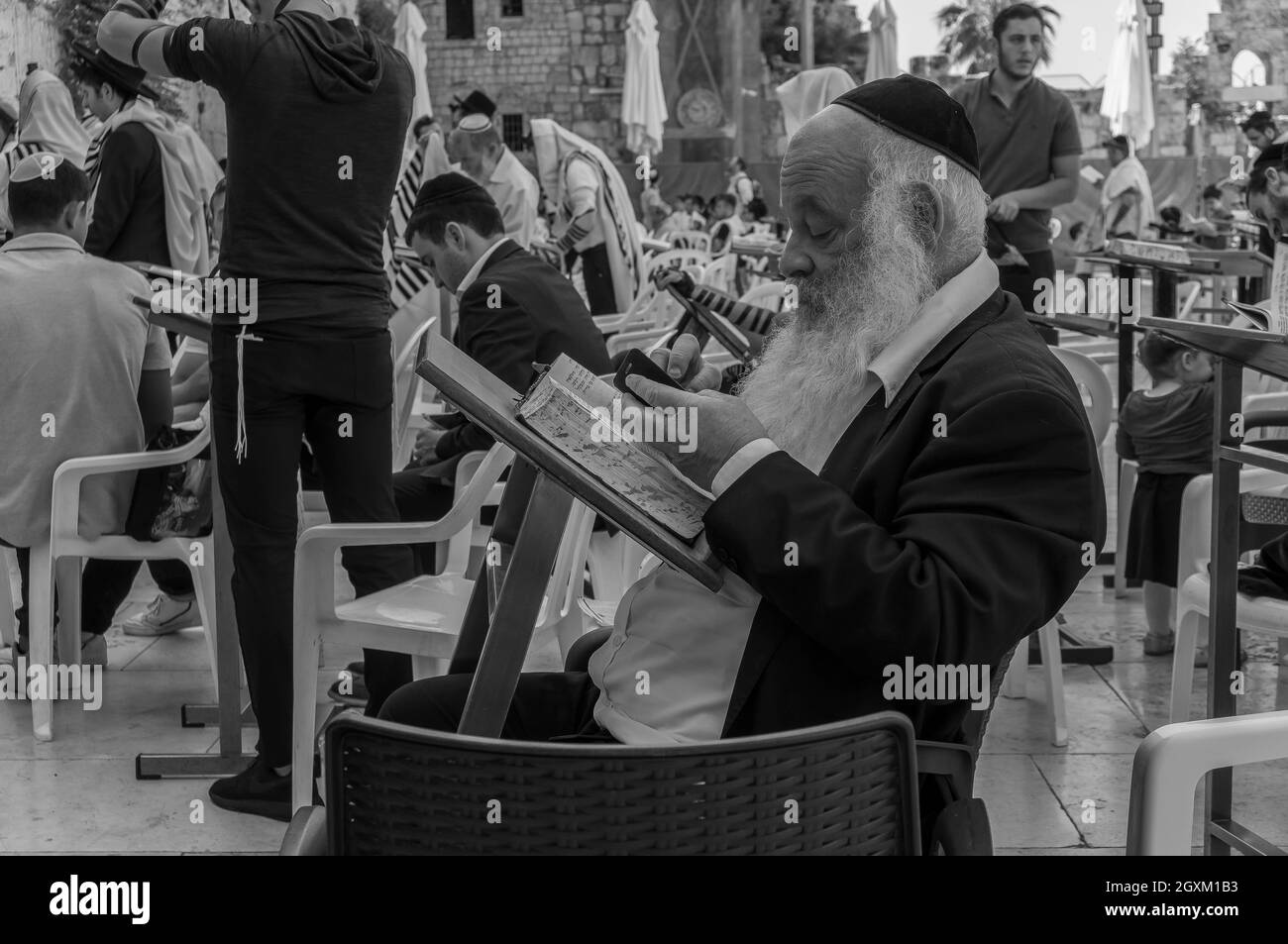 Orthodox Jew praying at Wailing Wall, Jerusalem. Black and white ...