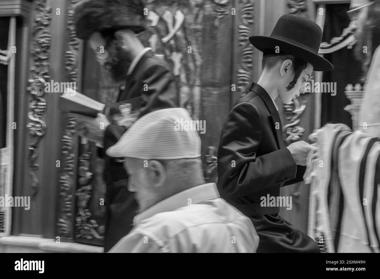 Orthodox Jew praying at Wailing Wall, Jerusalem. Black and white ...