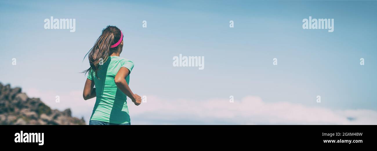 Girl runner running on trail run outdoor summer landscape in mountains ...