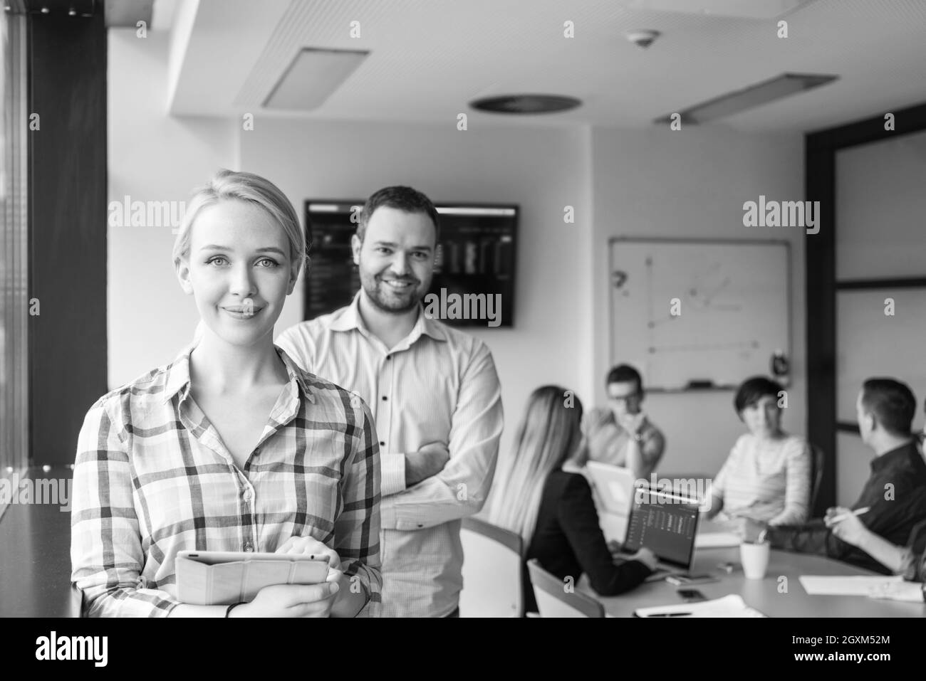 two business people preparing for next meeting and discussing ideas by ...