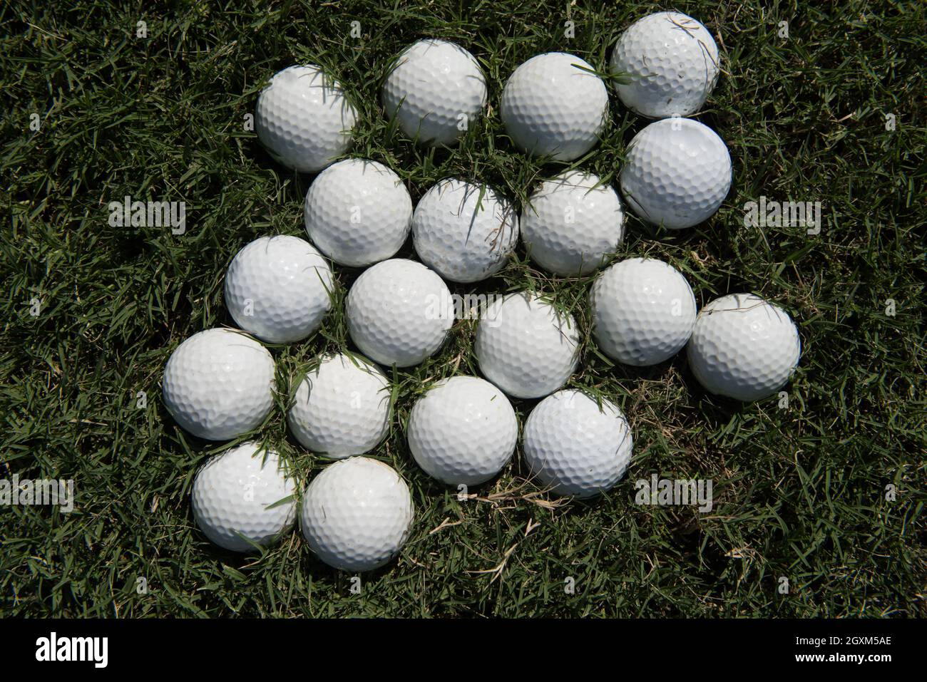 top view flat lay of golf balls with driver on grass background Stock ...