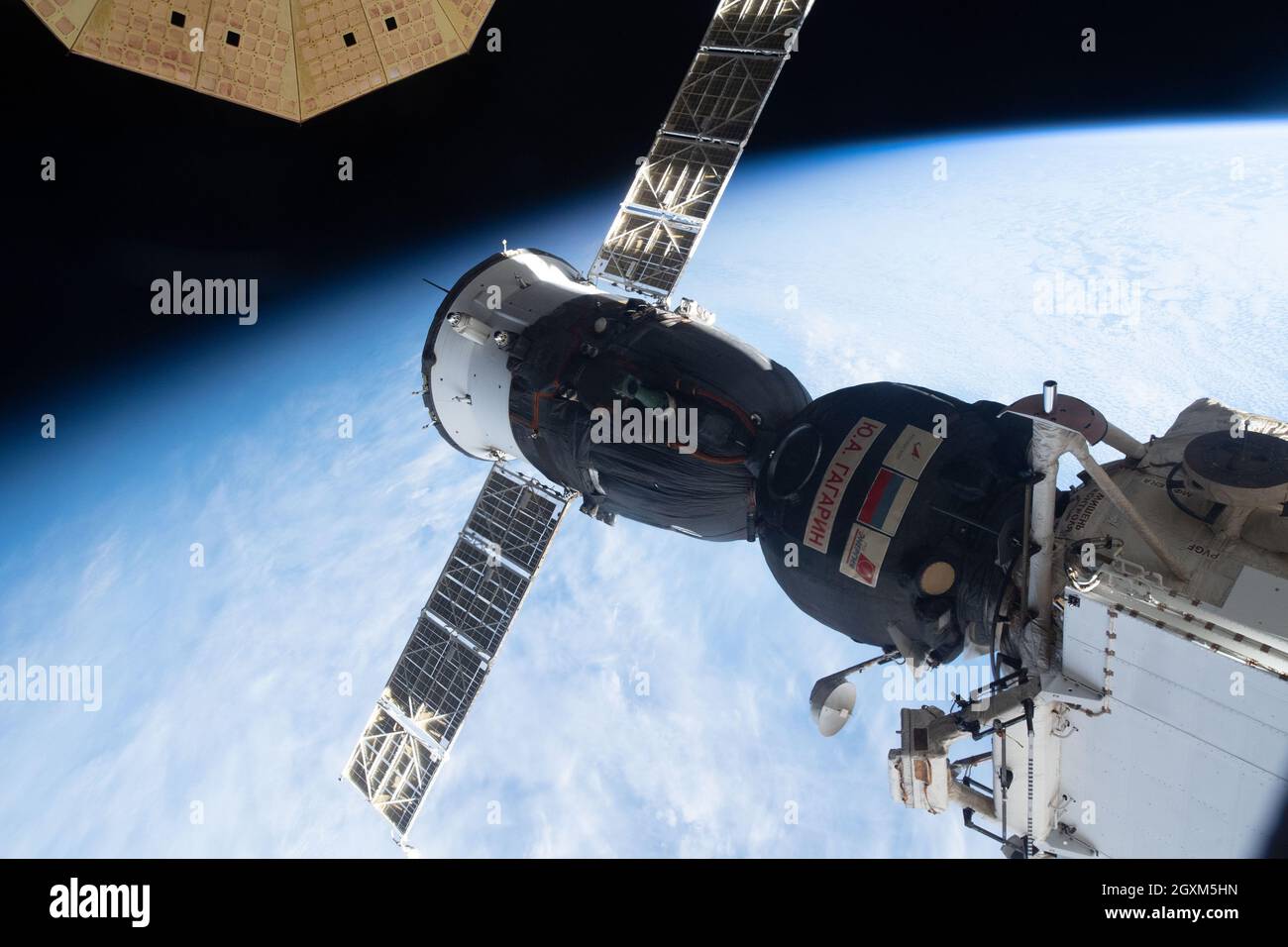 The Russian Soyuz MS-18 spacecraft carrying three Expedition 65 crew ...
