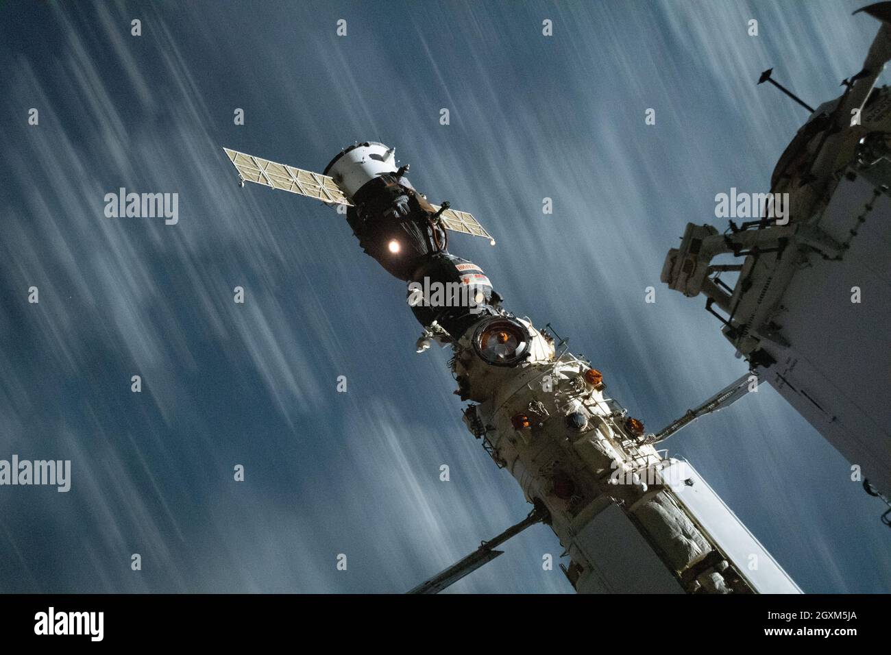 The Russian Soyuz MS-18 spacecraft carrying three Expedition 65 crew ...