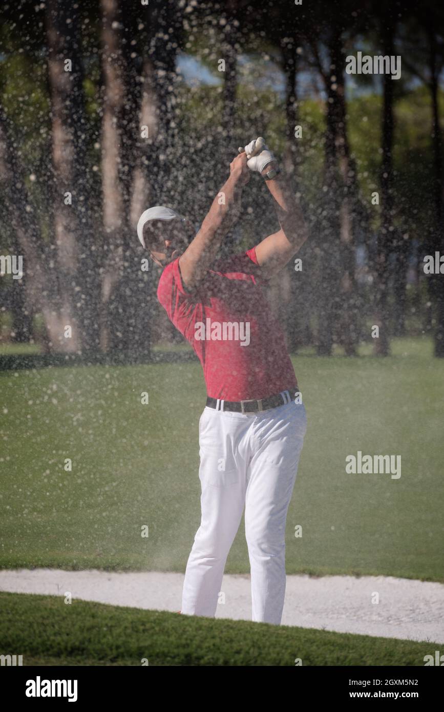 golf player shot ball from sand bunker at course Stock Photo - Alamy
