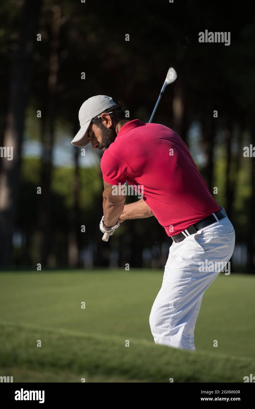 golf player shot ball from sand bunker at course Stock Photo - Alamy
