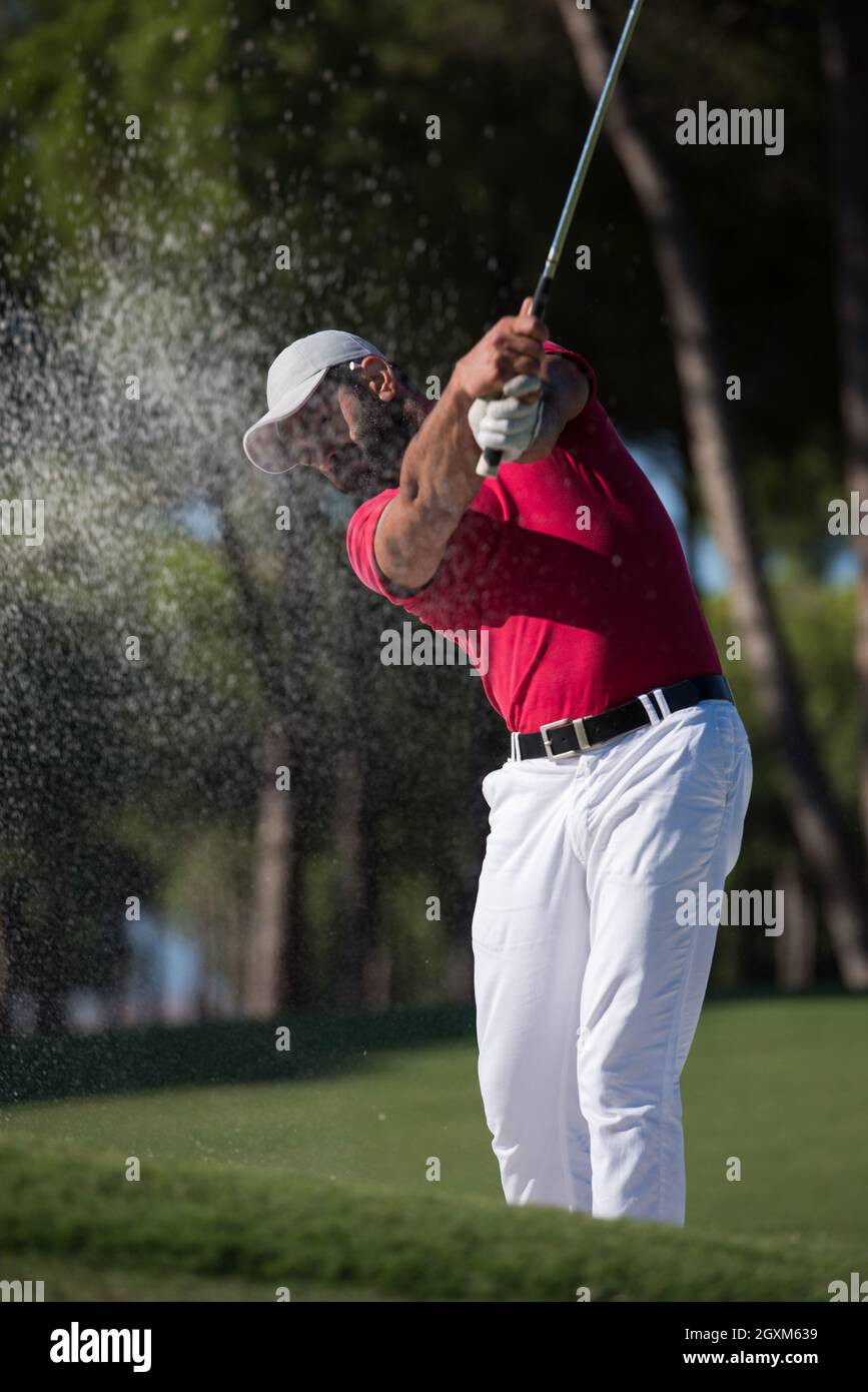 golf player shot ball from sand bunker at course Stock Photo - Alamy