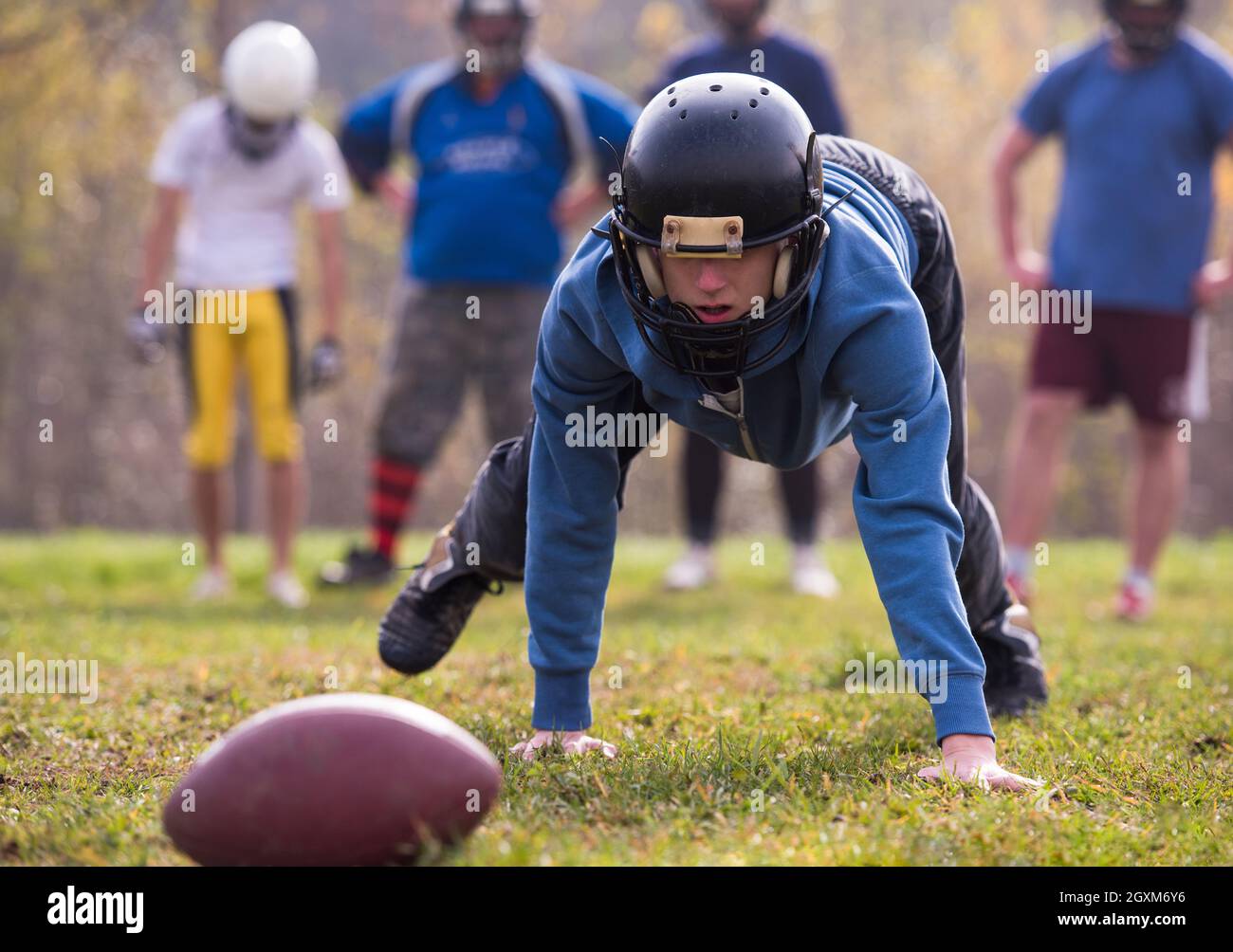 young american football player in action during the training at field ...