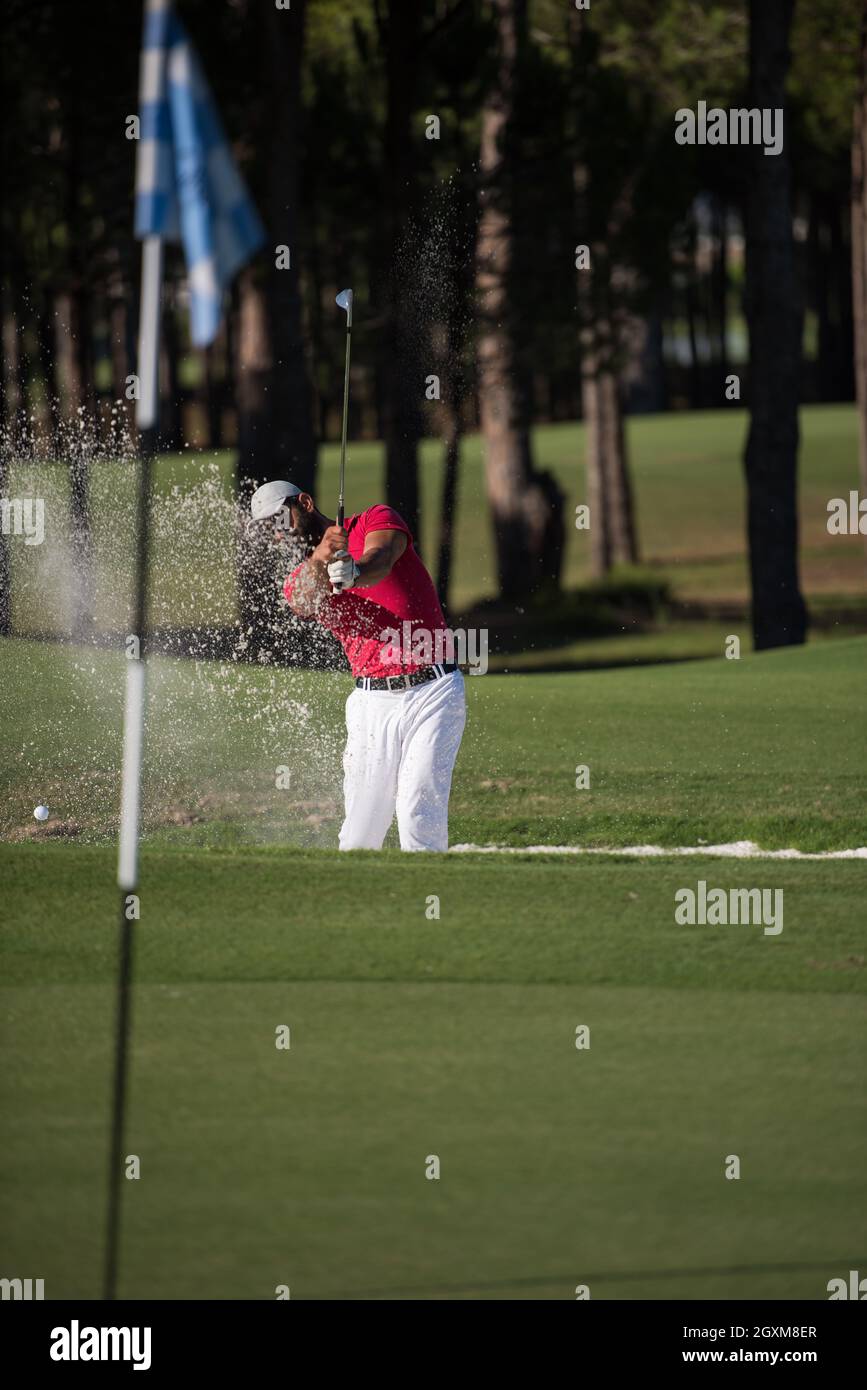golf player shot ball from sand bunker at course Stock Photo - Alamy