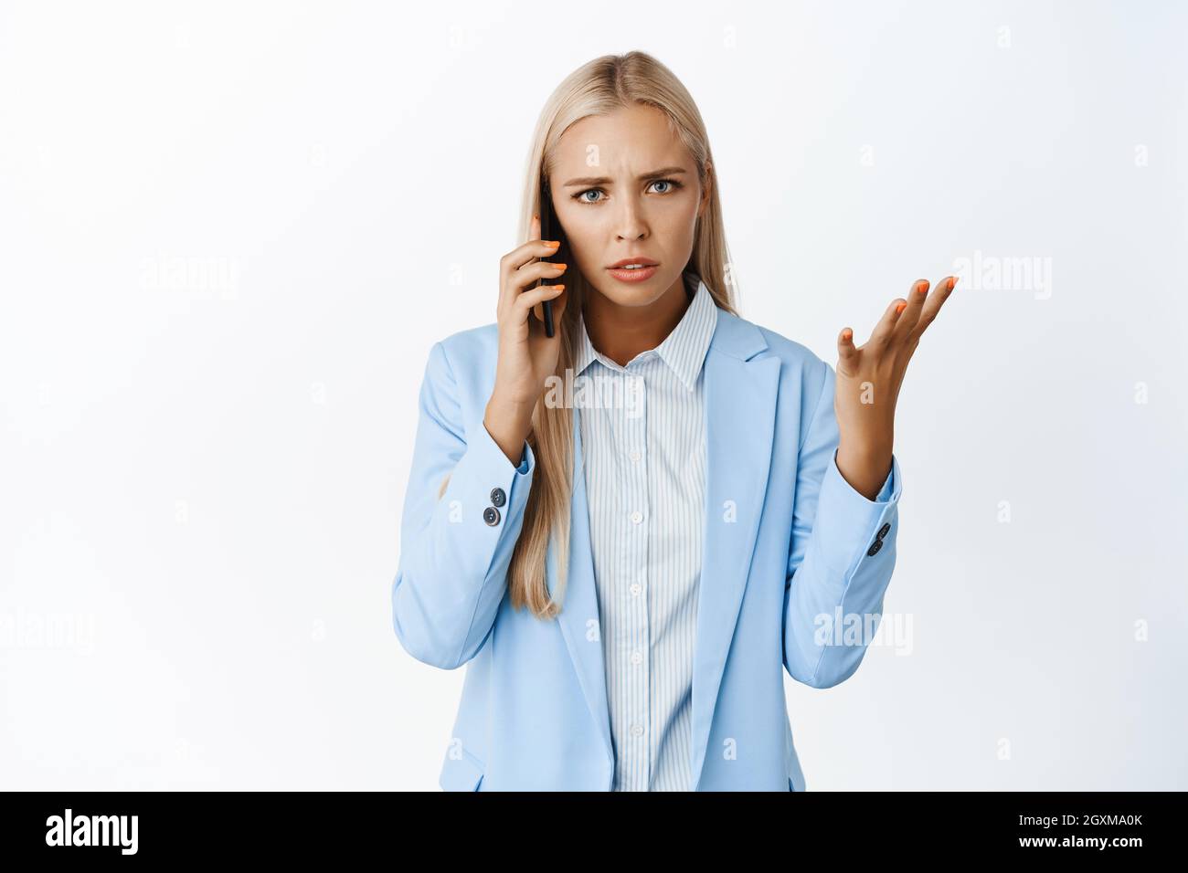 Annoyed and angry corporate woman answer phone call, looking furious ...