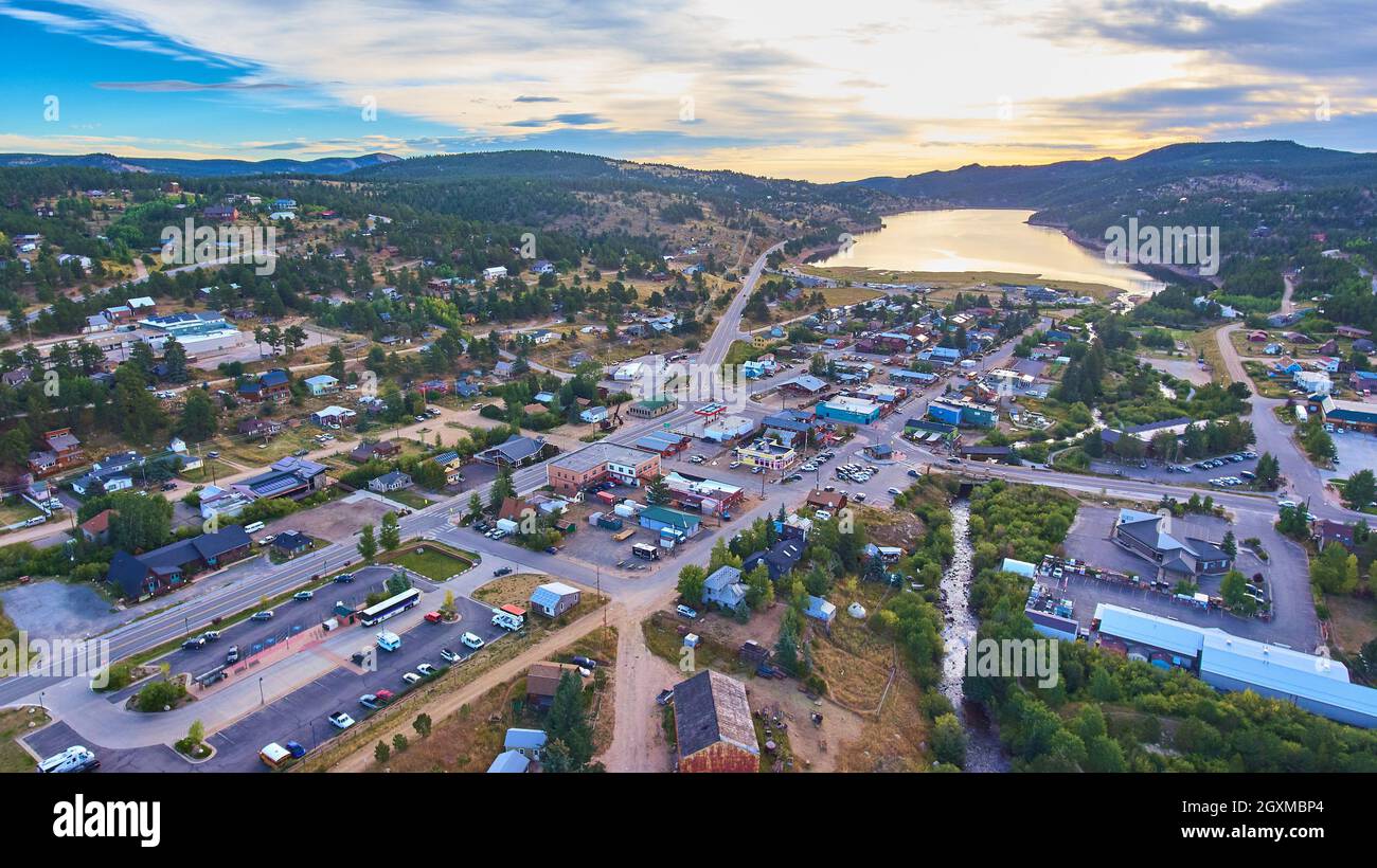 Aerial of small mountain town by lake Stock Photo - Alamy