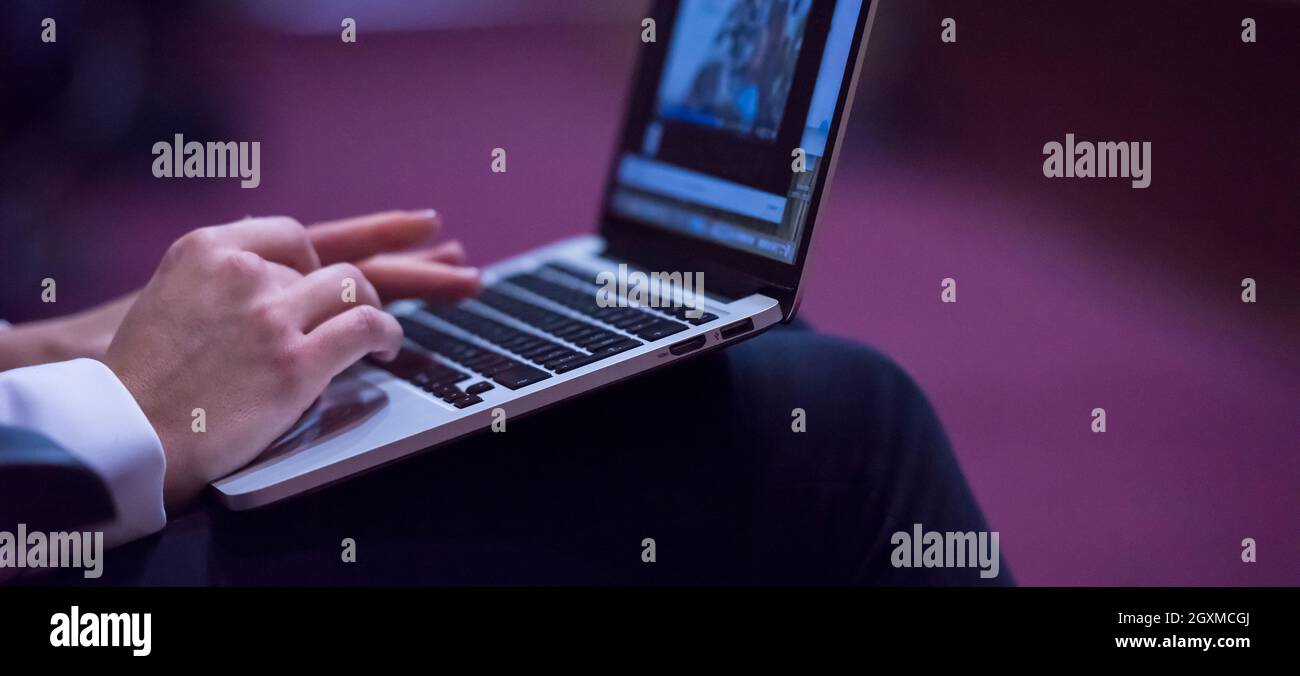 business people hands typing on laptop computer keyboard during the ...