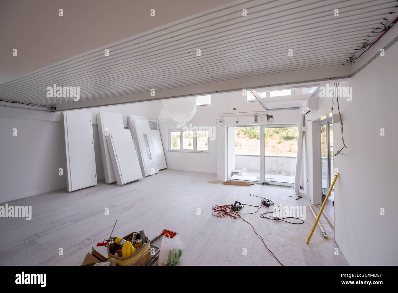 Interior doors stacked in a new apartment waiting for installation ...