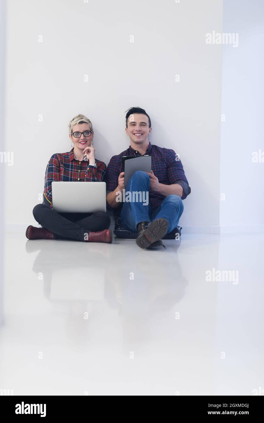 startup business and new mobile technology concept with young couple in ...