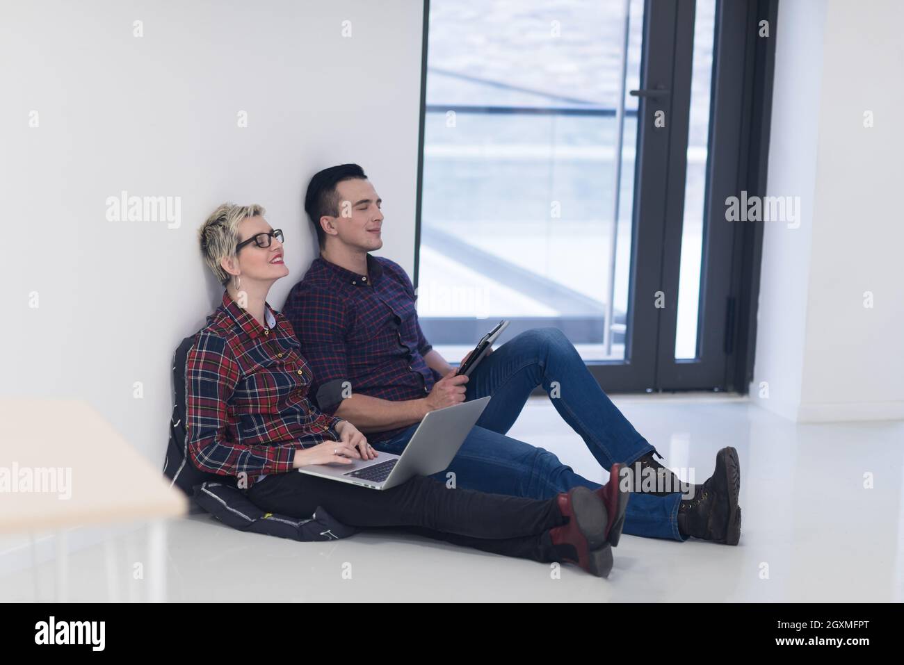 startup business and new mobile technology concept with young couple in ...