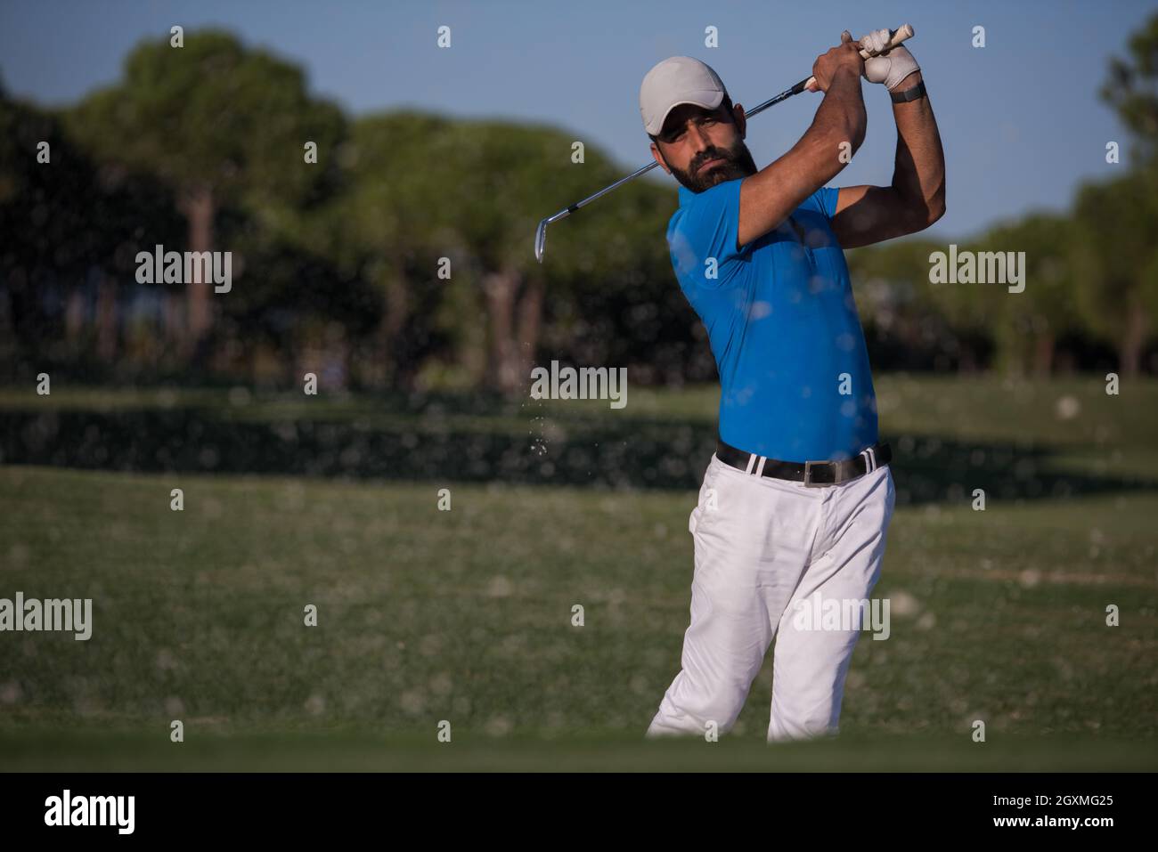 pro golf player shot ball from sand bunker at course Stock Photo - Alamy