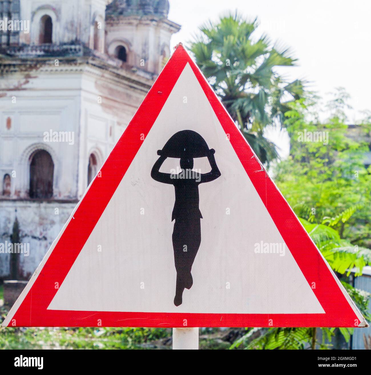 Warning sign people carry loads on their heads in Puthia village ...