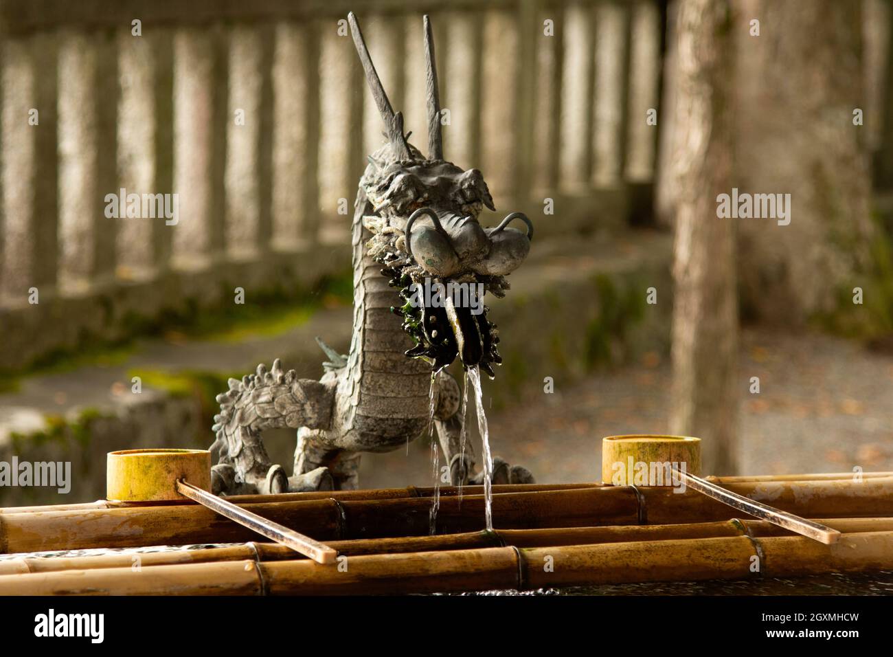 Dragon water feature with ladles, Sengen Shrine at the Oshino Hakkai ...