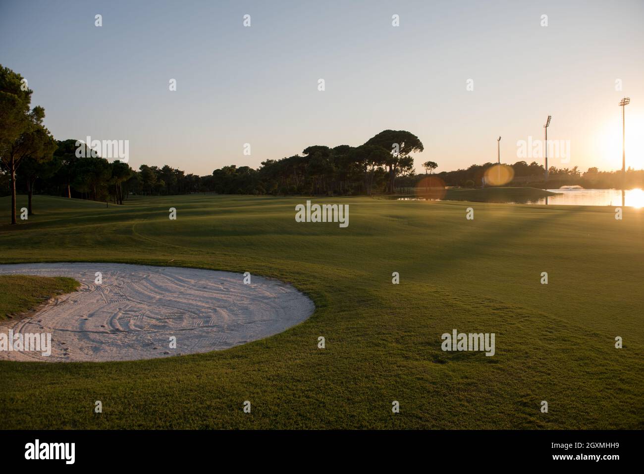 golf course landscape at beautiful sunset Stock Photo - Alamy