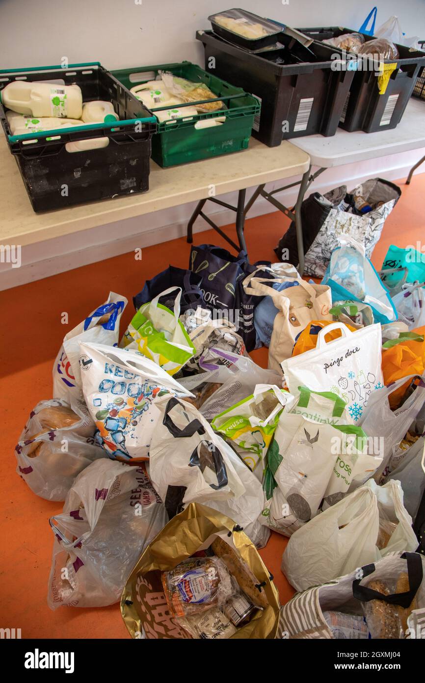 Bags and crates of food and drink donations, at a food bank ready for ...