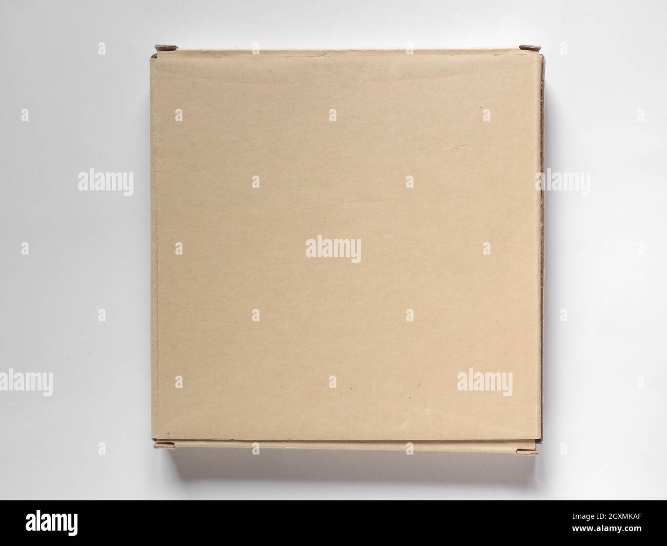 corrugated cardboard box for small packet or parcel Stock Photo - Alamy