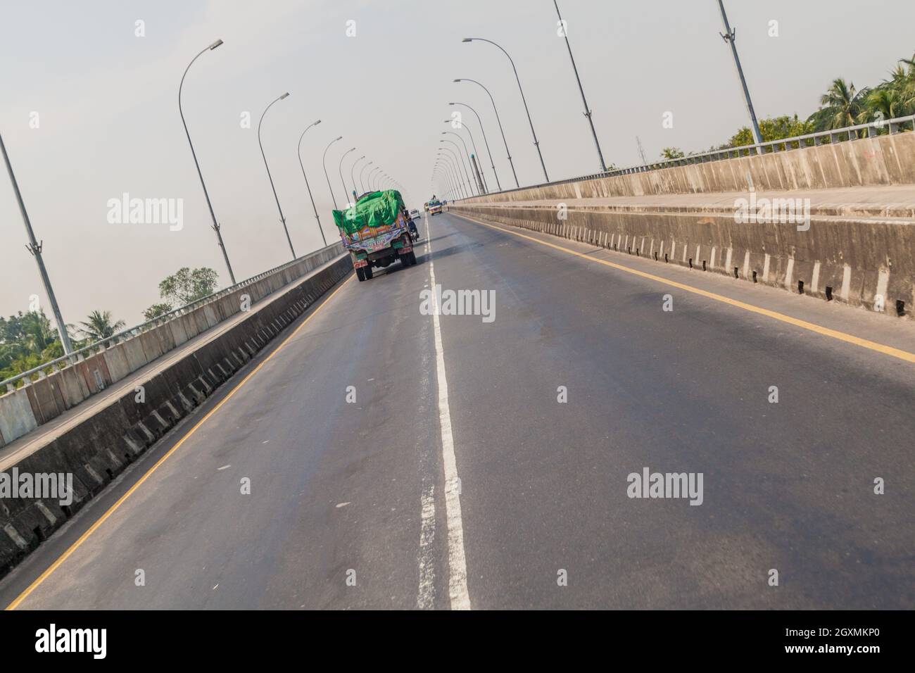 KHULNA, BANGLADESH - NOVEMBER 16, 2016: Traffic on Khan Jahan Ali ...