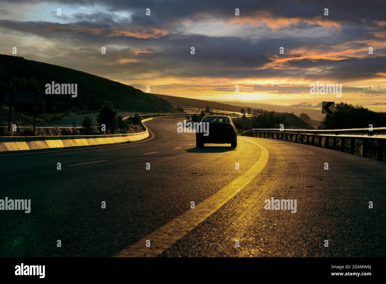 Car driving on winding hi-res stock photography and images - Alamy