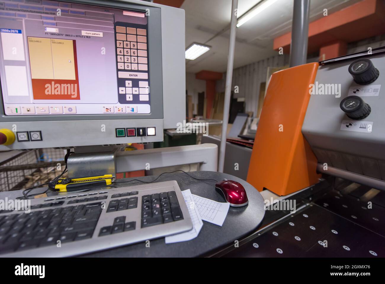 CNC wood cutting machine in big modern factory for the production of ...