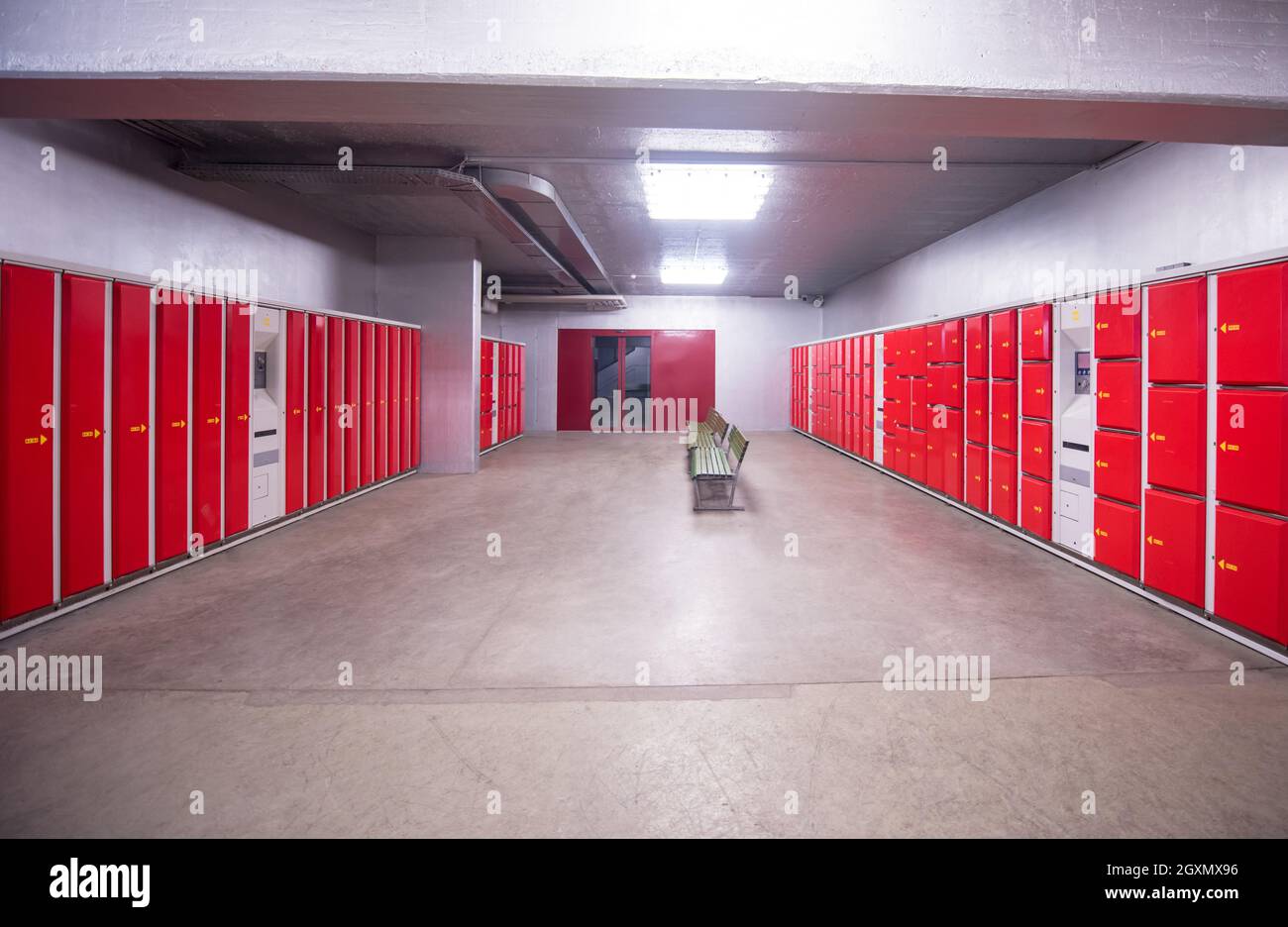 red safety lockers in empty Lockers Room Stock Photo - Alamy